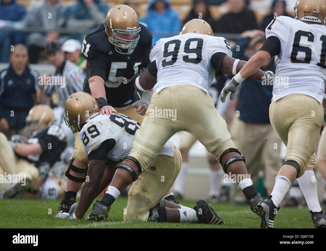 Notre Dame Center Dan Wenger (#51) blocks Defensive End Kapron Lewis ...