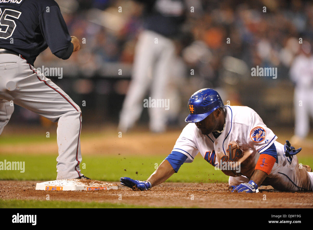 20 April, 2010: New York Mets second baseman Luis Castillo (1) slides ...