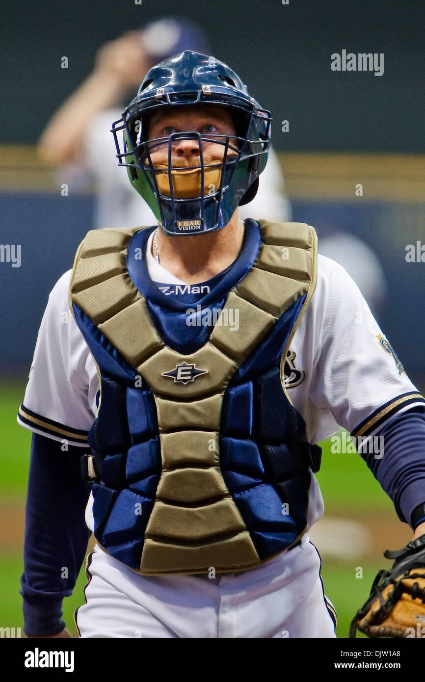 Milwaukee Brewers catcher Gregg Zaun (9) returns to the plate after ...