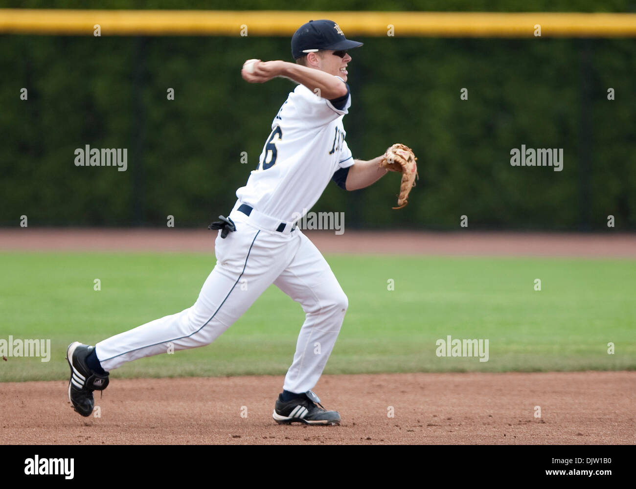 Notre Dame shortstop Mick Doyle (#26) throws to first in game action ...