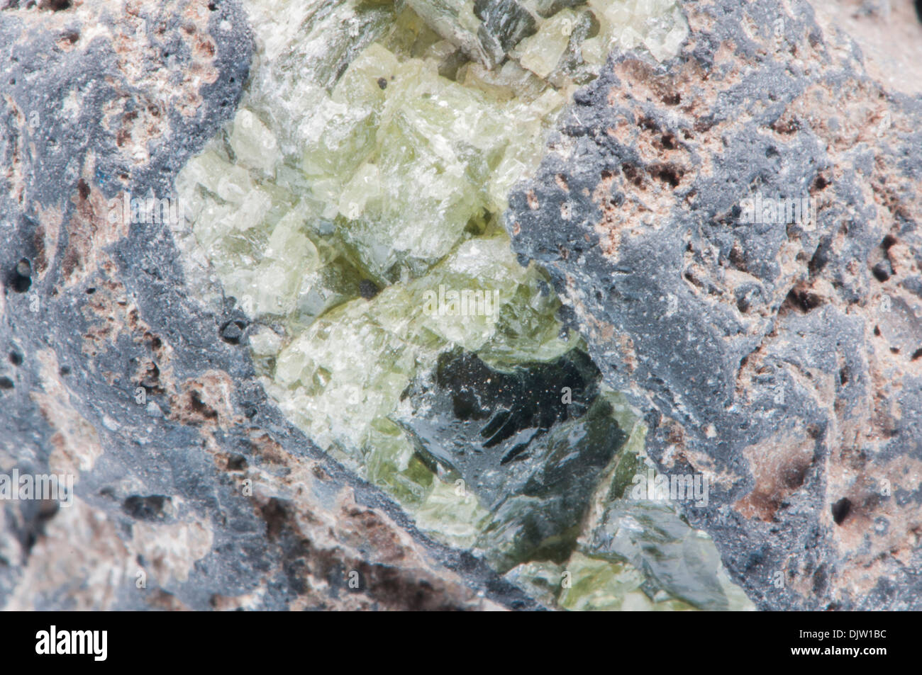 greenish mineral of volcanic rock Stock Photo - Alamy