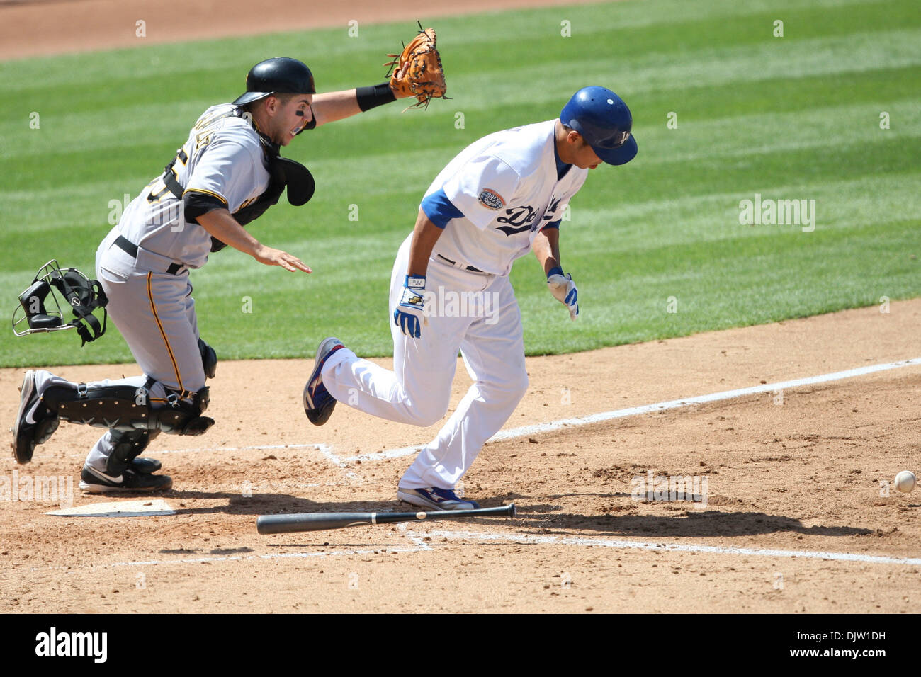 02 May 2010: Pirates catcher #35 Jason Jaramillo (L) chases down the ...