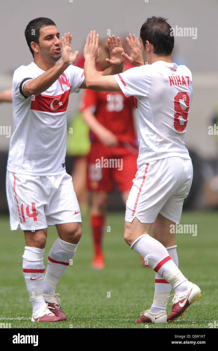 Turkey midfielder Arda Turan (14) and forward Nihat Kahveci (8) get ...