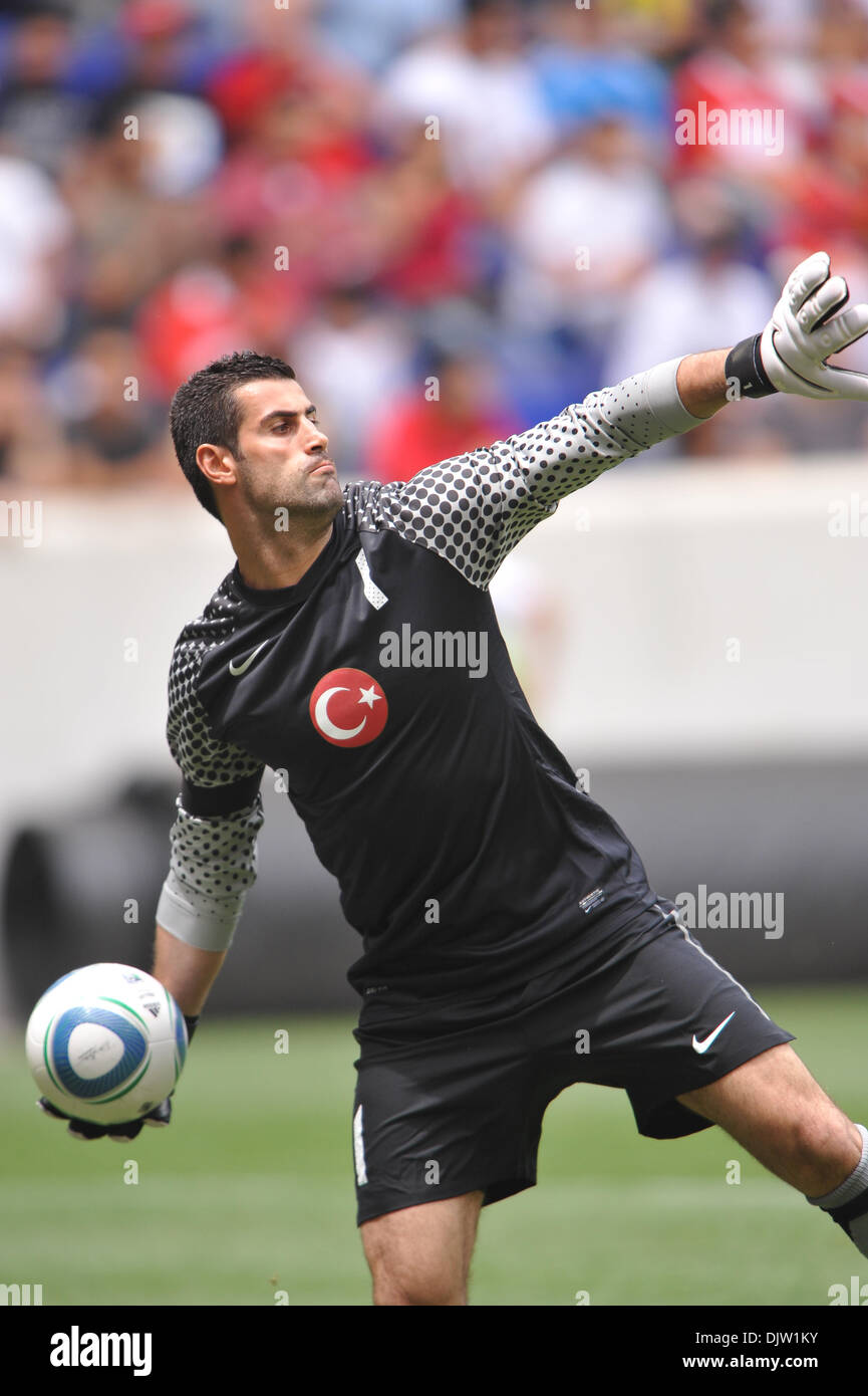 Turkey goalkeeper Volkan Demirel (1) throws the ball from the crease ...