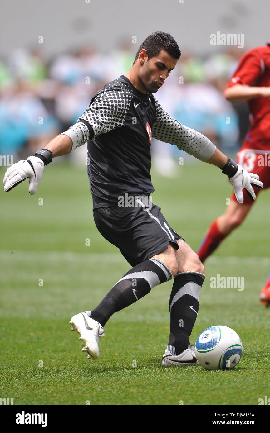 Turkey goalkeeper Volkan Demirel (1) clears the ball during first half ...