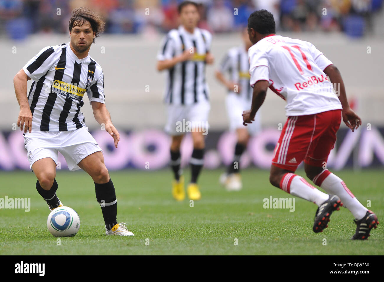 Red Bulls defender Danleigh Borman (11) marks Juventus FC midfielder ...
