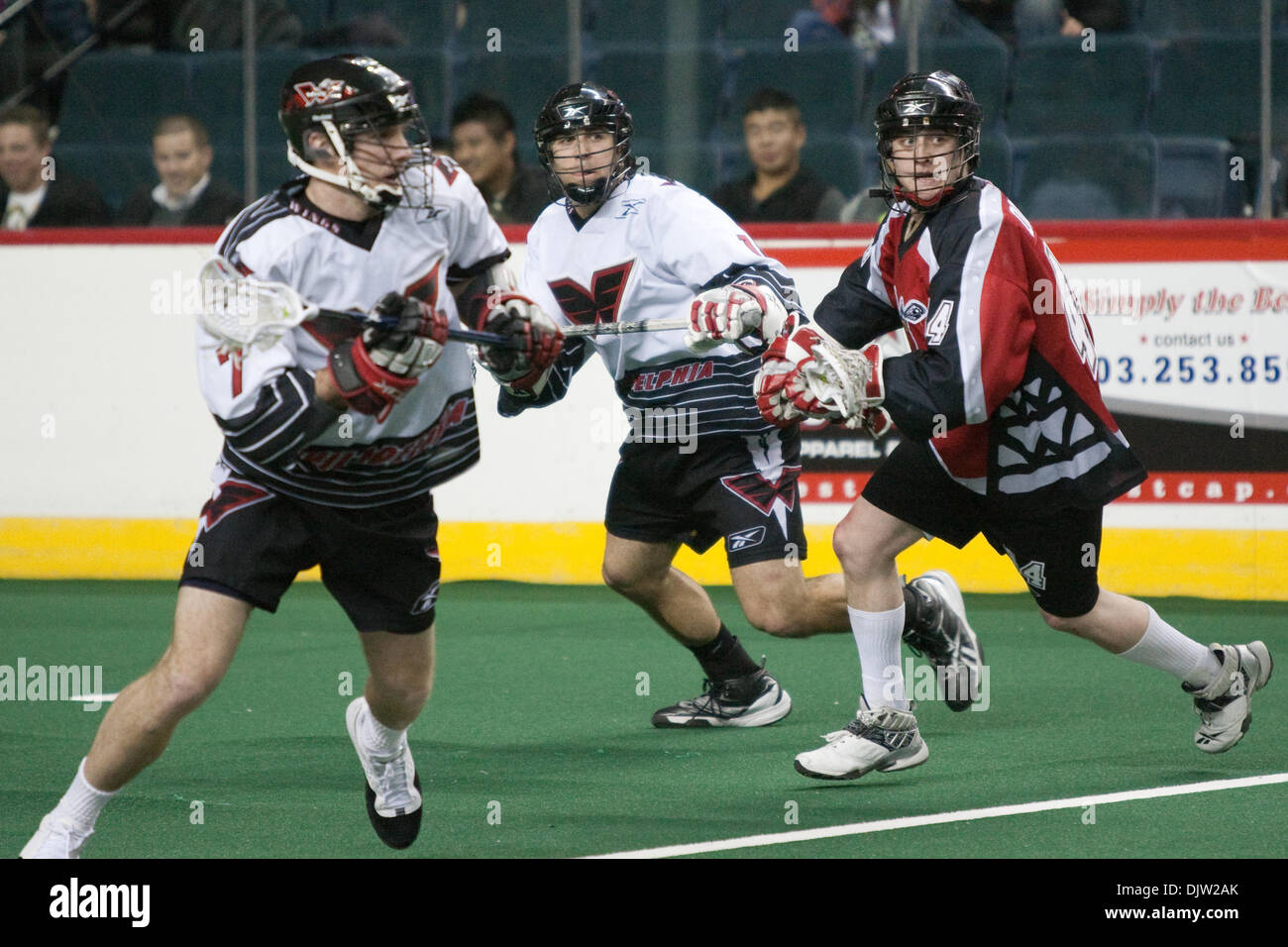 Philadelphia WIngs defenseman Kyle Sweeney (7) and Calgary Roughnecks ...