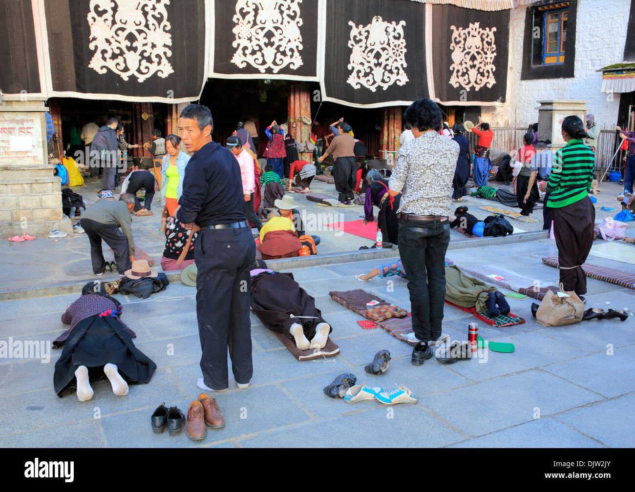 People praying near Jokhang temple, Lhasa, Tibet, China Stock Photo - Alamy