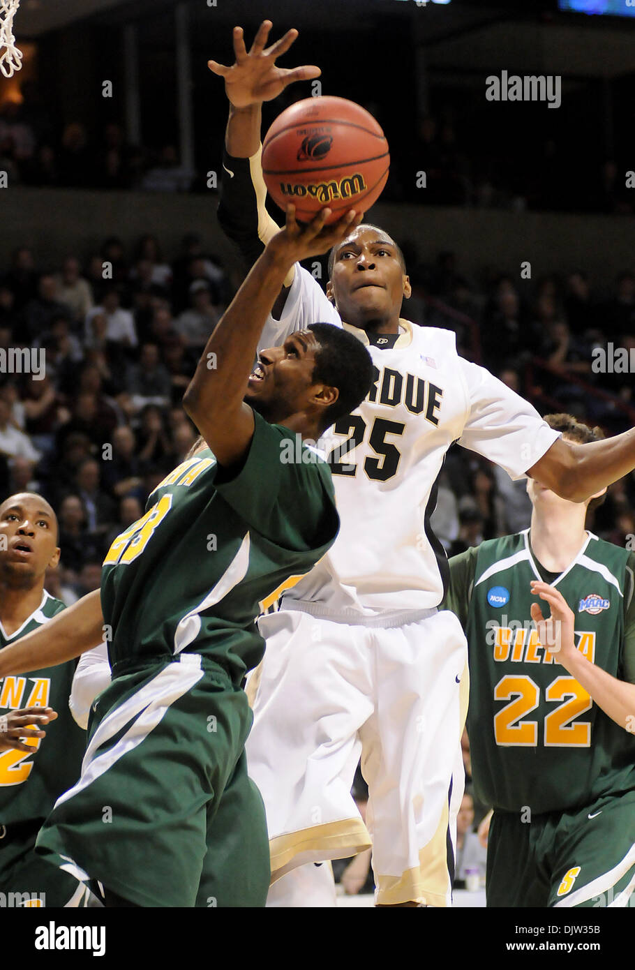 Purdue's forward JaJuan Johnson (25) tries to block the shot of Siena's ...