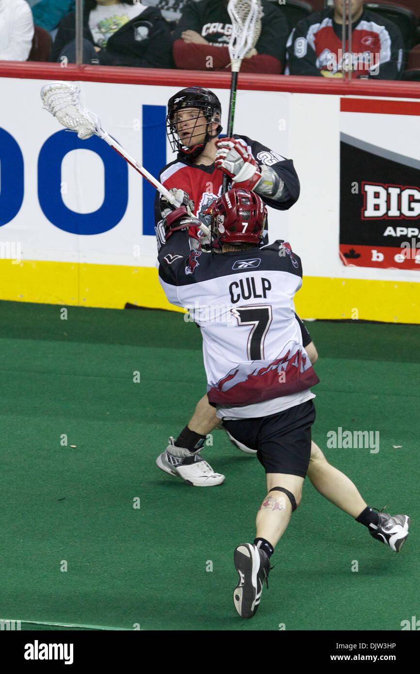 Calgary Roughnecks Defenceman Bruce Codd (20) and Colorado Mammoth ...