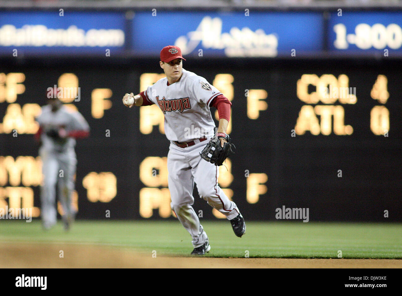 Arizona Diamondbacks Kelly Johnson throws out San Diego Padres Jerry ...