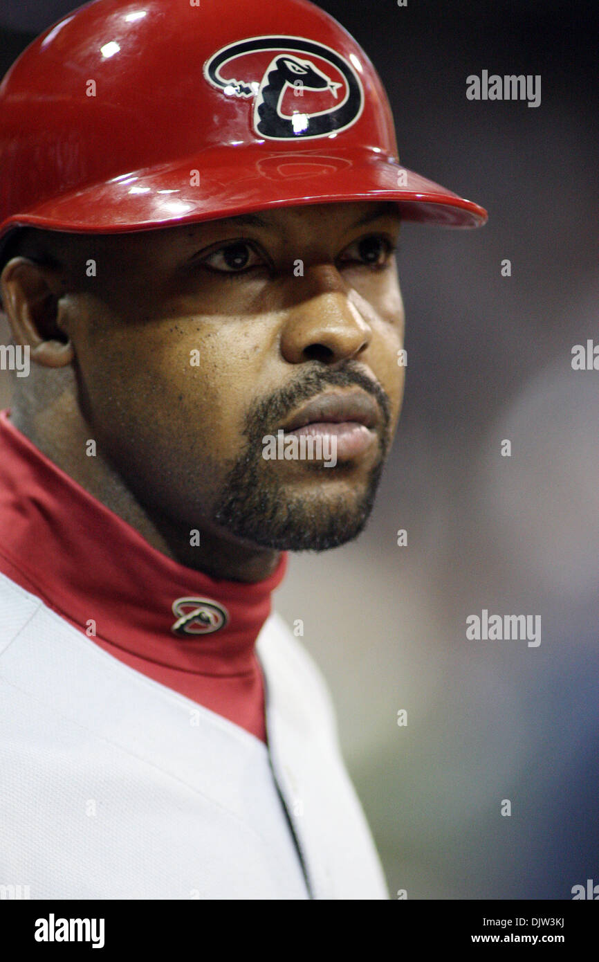 Arizona Diamondbacks third base coach Bo Porter watches as Chris Young ...