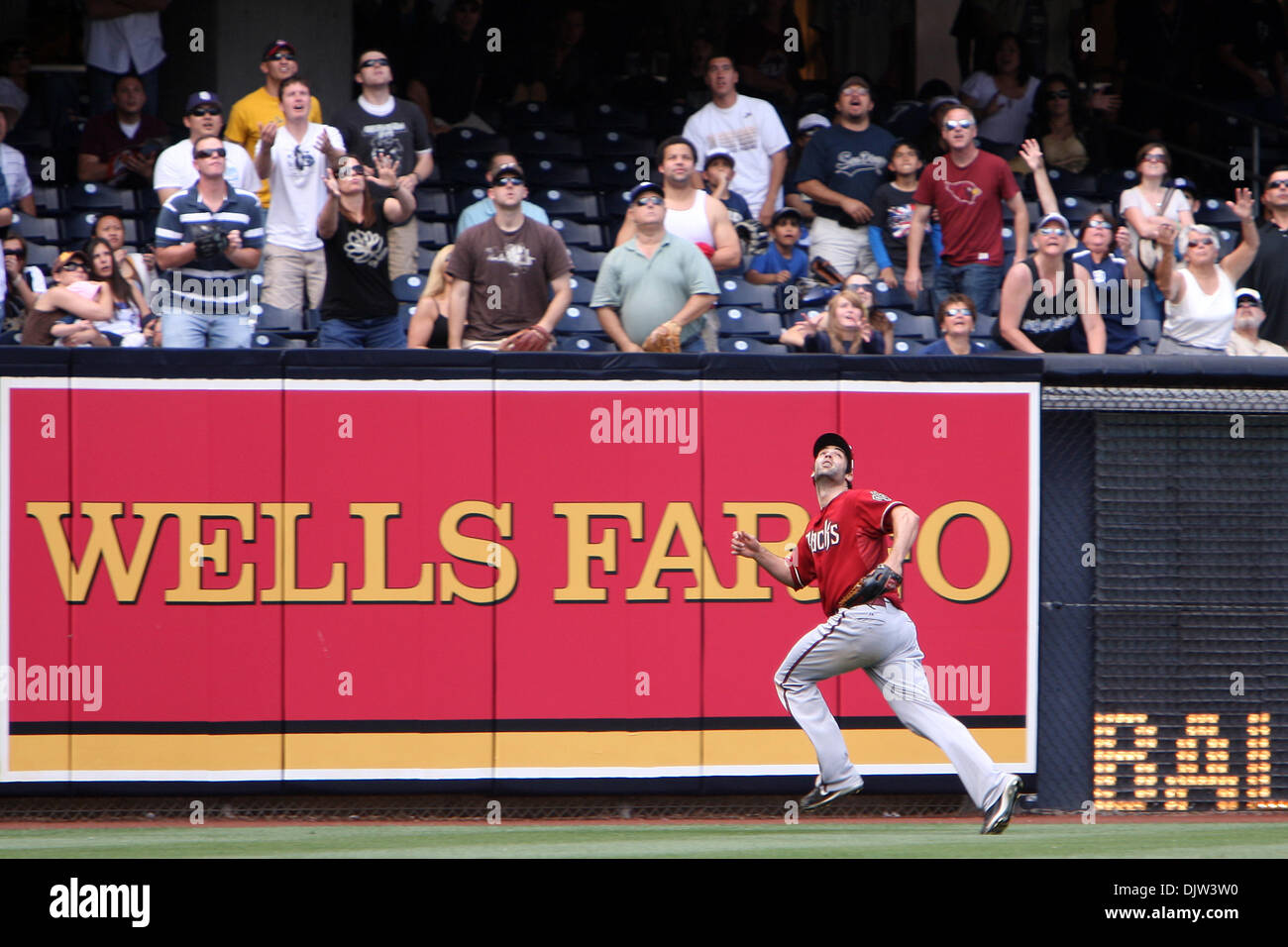 Arizona Diamondbacks Conor Jackson watches as San Diego Padres Scott ...