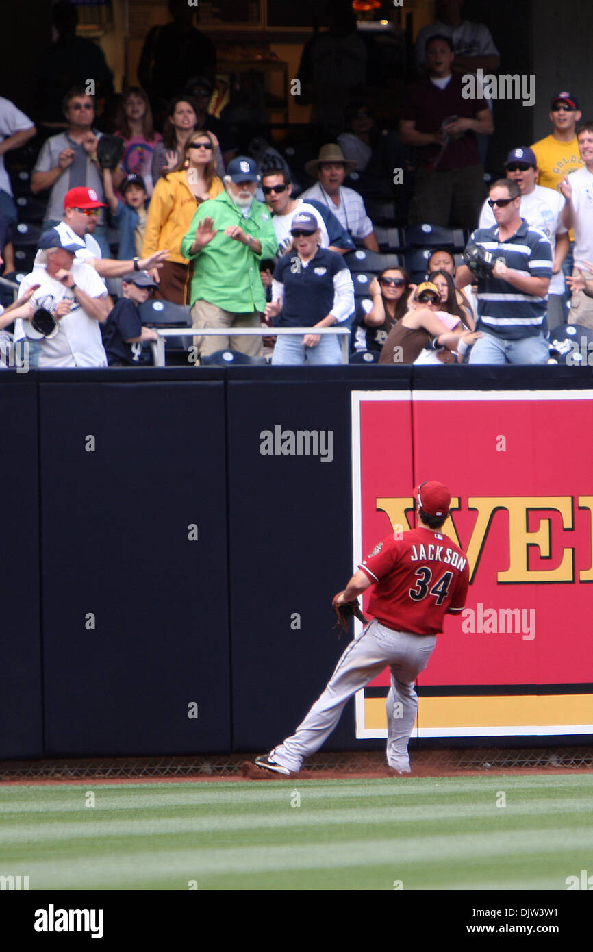 Arizona Diamondbacks Conor Jackson watches as San Diego Padres Scott ...