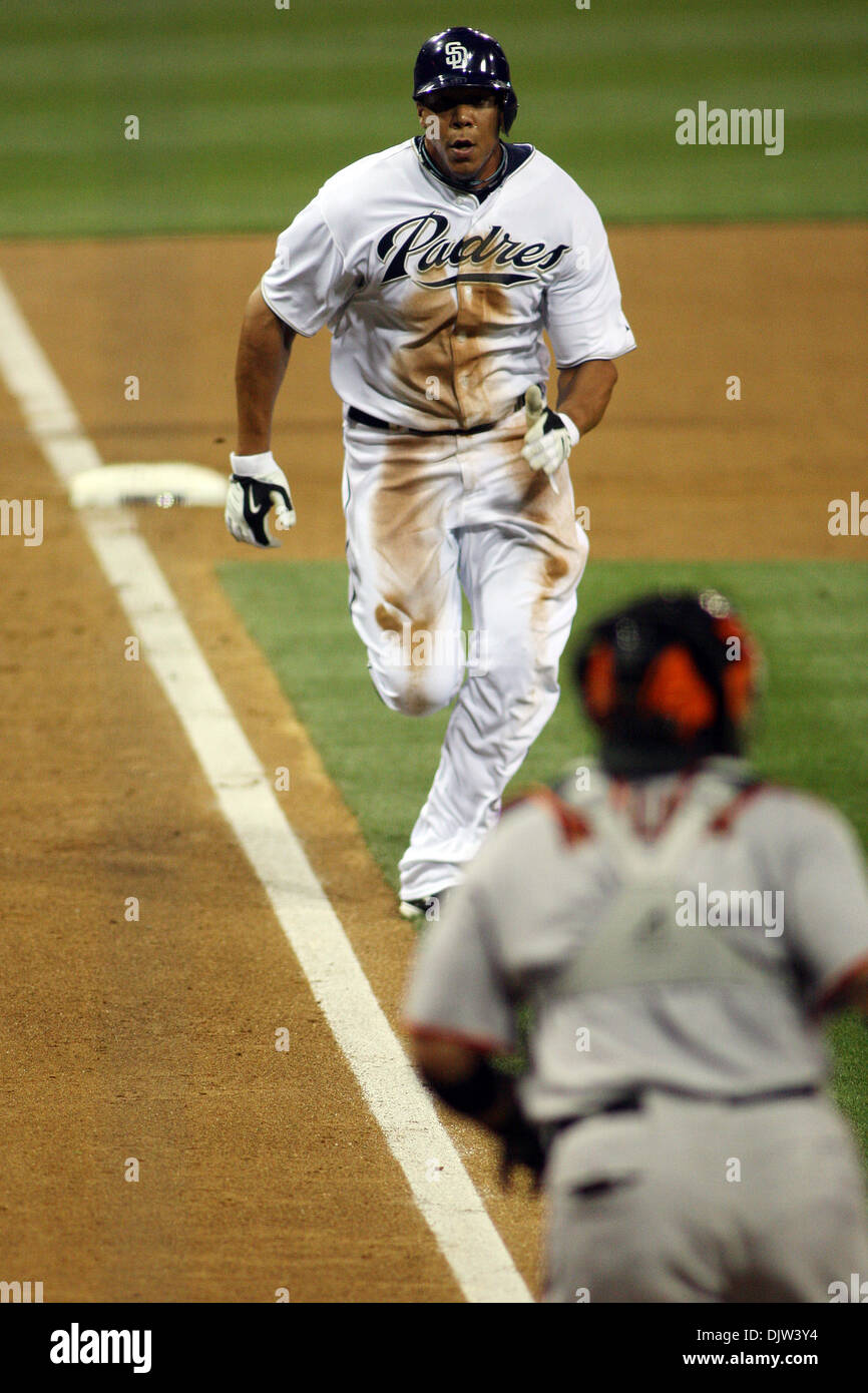 San Diego Padres Kyle Blanks scores on a sacrifice by Will Venable ...
