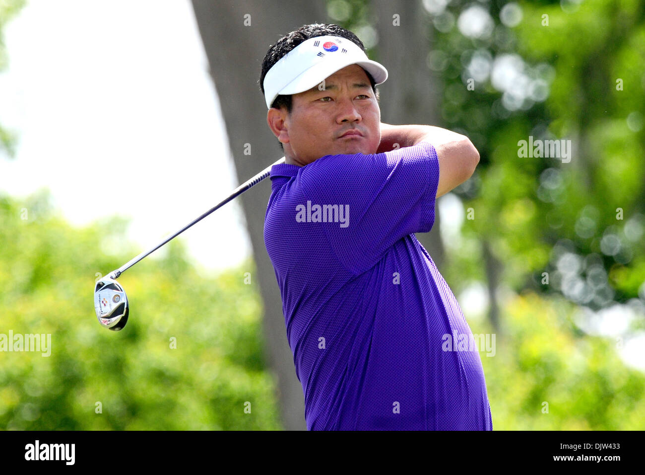 K.J. Choi hits his tee shot on the seventh hole during the first round ...