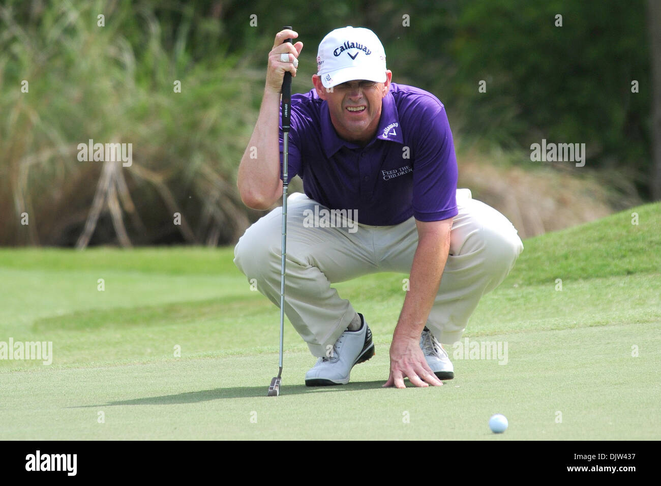 Former two time US Open Champion, Lee Janzen, lines up a putt during ...