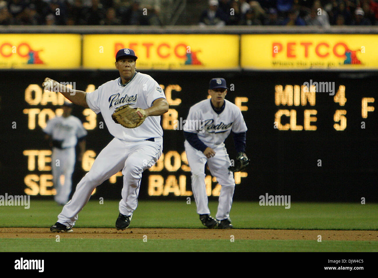 San Diego Padres Kyle Blanks fields a ground ball by Milwaukee Brewers ...