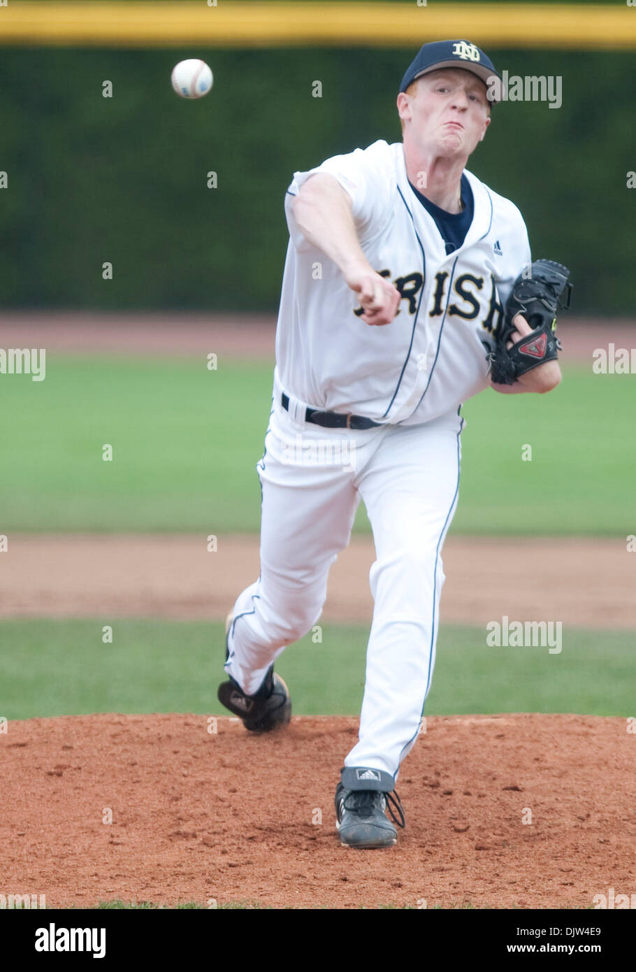 Notre Dame pitcher Cole Johnson (#37) delivers pitch in game action ...