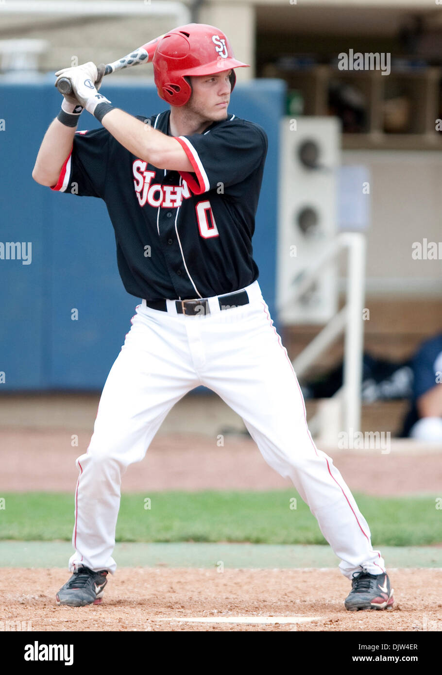 St. John's second baseman Matt Wessinger (#0) at bat in game action ...