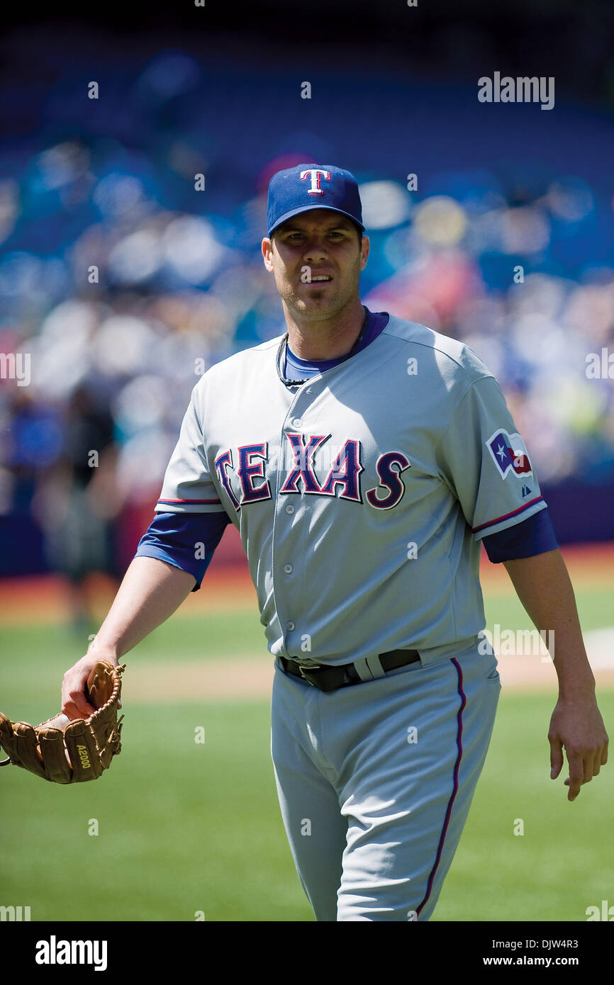 Texas Rangers Colby Lewis #48 throws a pitch in the third inning. Colby ...
