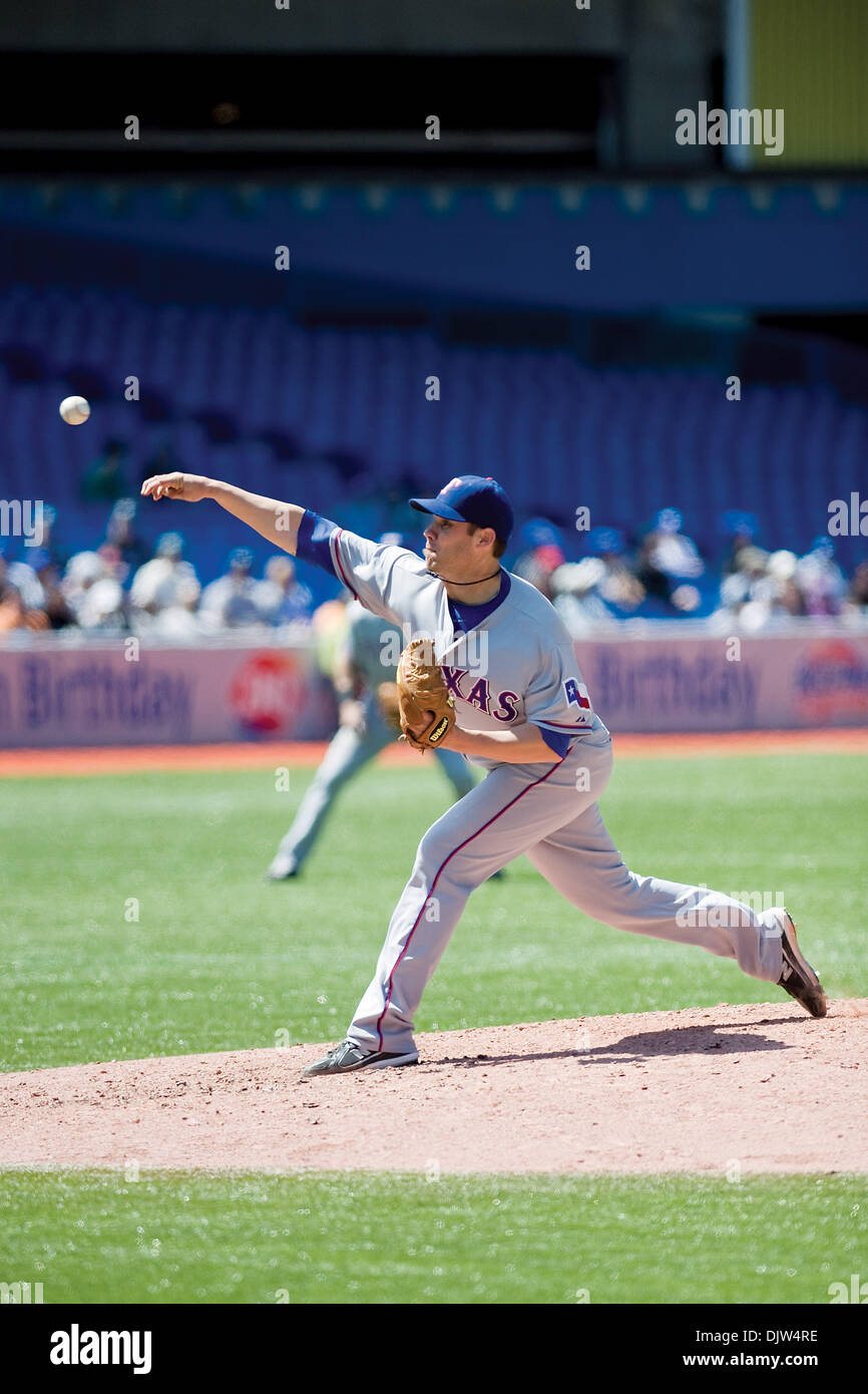 Texas Rangers Colby Lewis #48 throws a pitch in the fifth inning. Colby ...