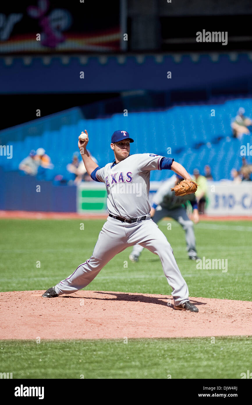 Texas Rangers Colby Lewis #48 throws a pitch in the sixth inning. Colby ...