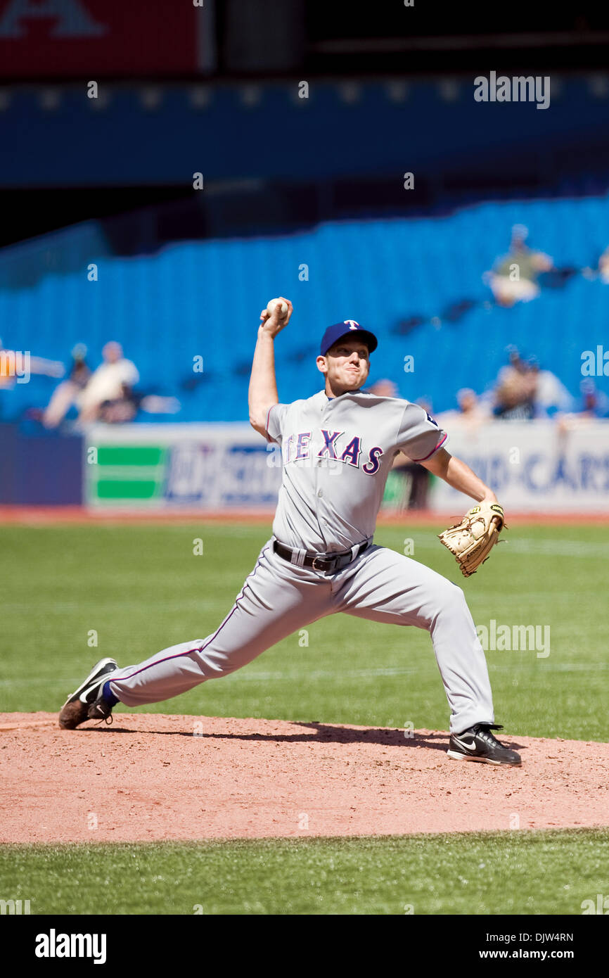 Texas Rangers Colby Lewis #48 throws a pitch in the sixth inning. Colby ...