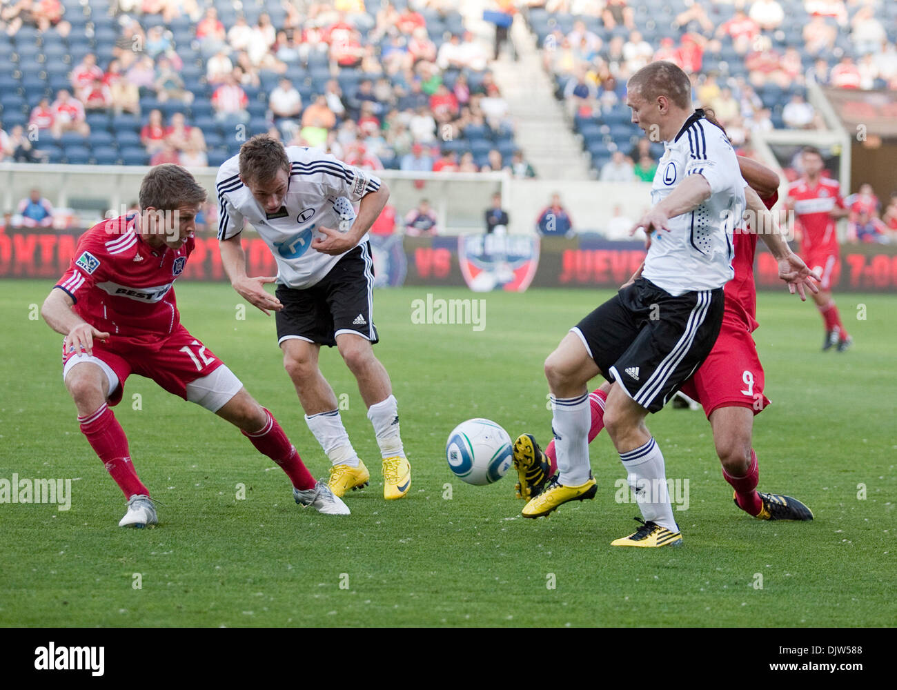 Legia Warsaw Midfielder Maciej Iwanski (#8) and Chicago Fire players ...