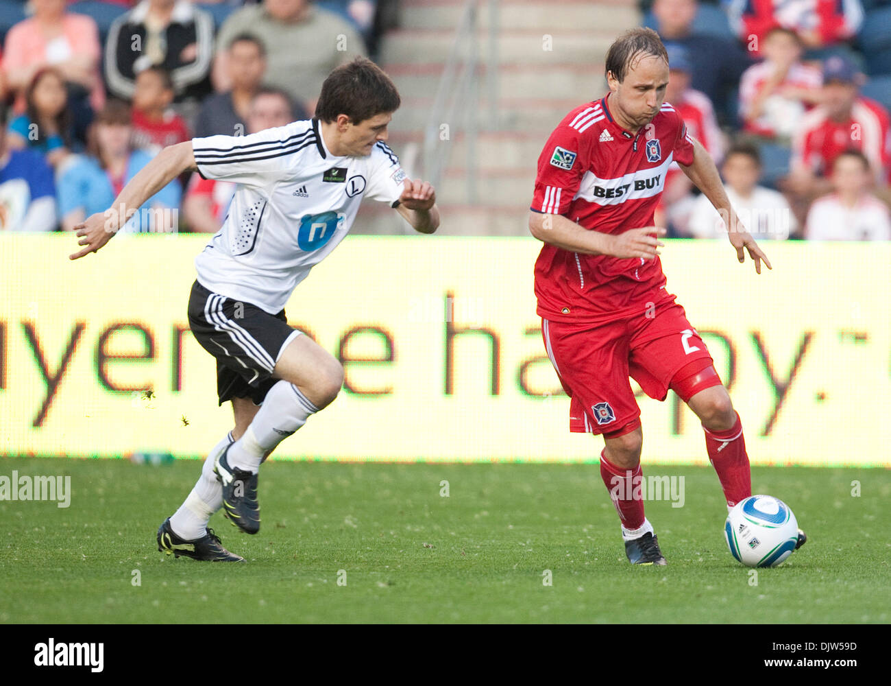 Chicago Fire Midfielder Justin Mapp (#21) make a move on Lefia Warsaw ...