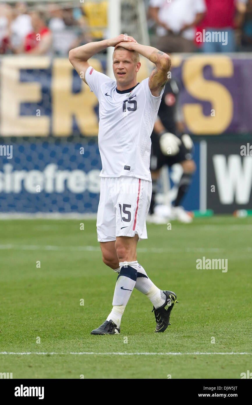 United States mid-fielder Jay DeMerit (15) with his hands on his head ...