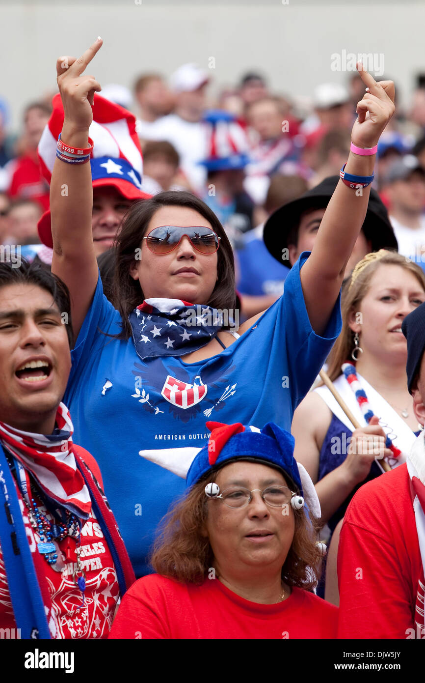 A United States fan giving the Turkey players a two finger salute ...