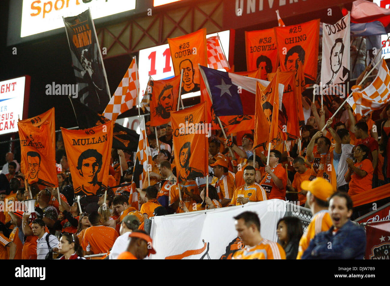 Houston Dynamo fans wave flags in support of the team. With two back to ...