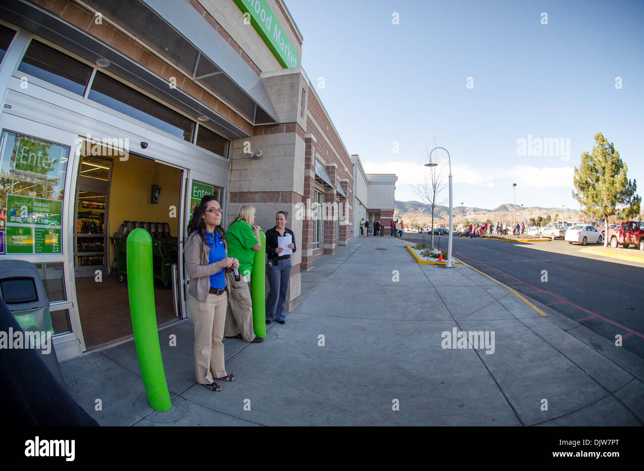 Boulder, Colorado, USA. 29th Nov, 2013. Walmart employees look outside ...