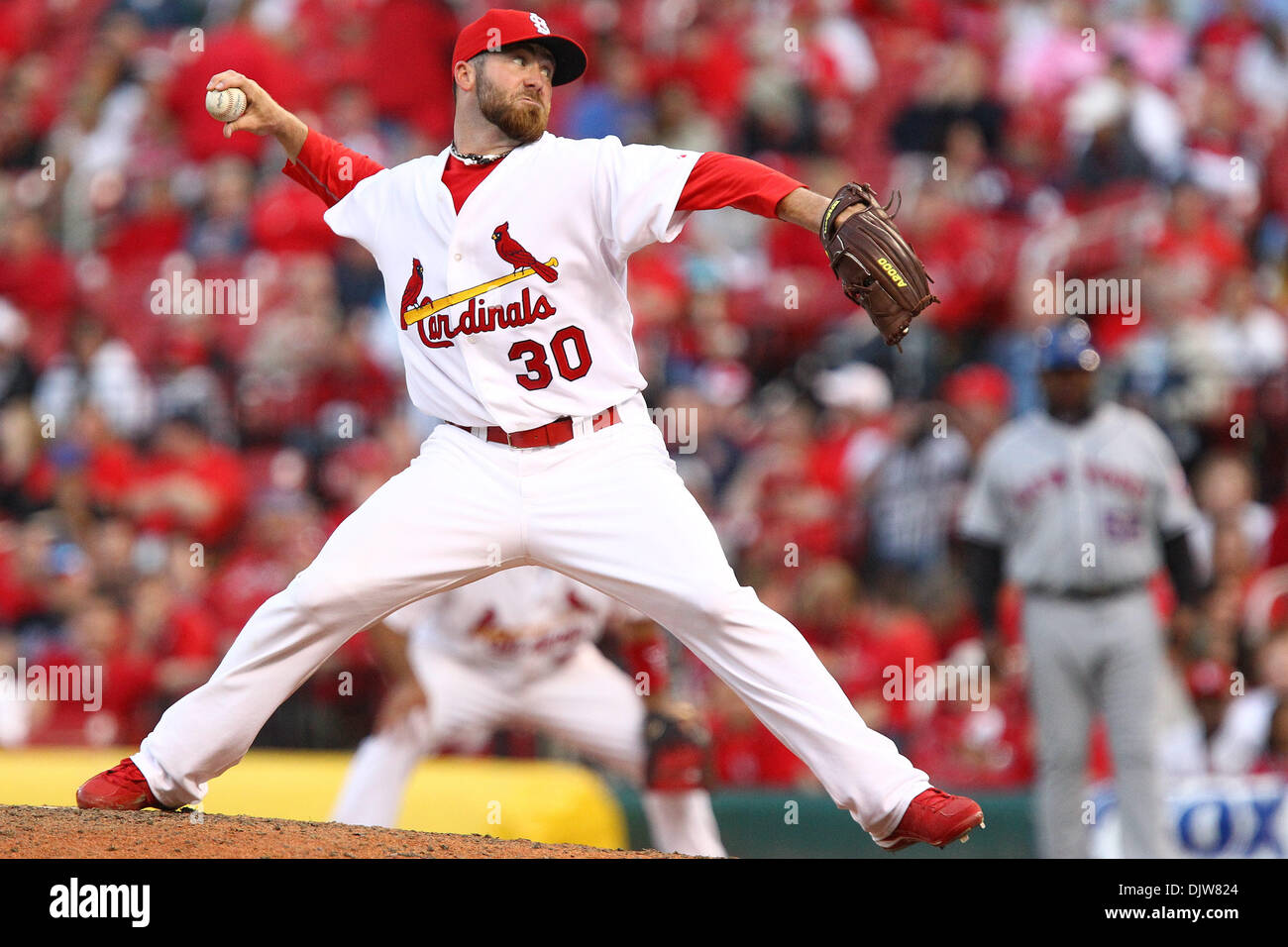 St. Louis Cardinals Pitcher Jason Motte delivers a pitch to a New York ...