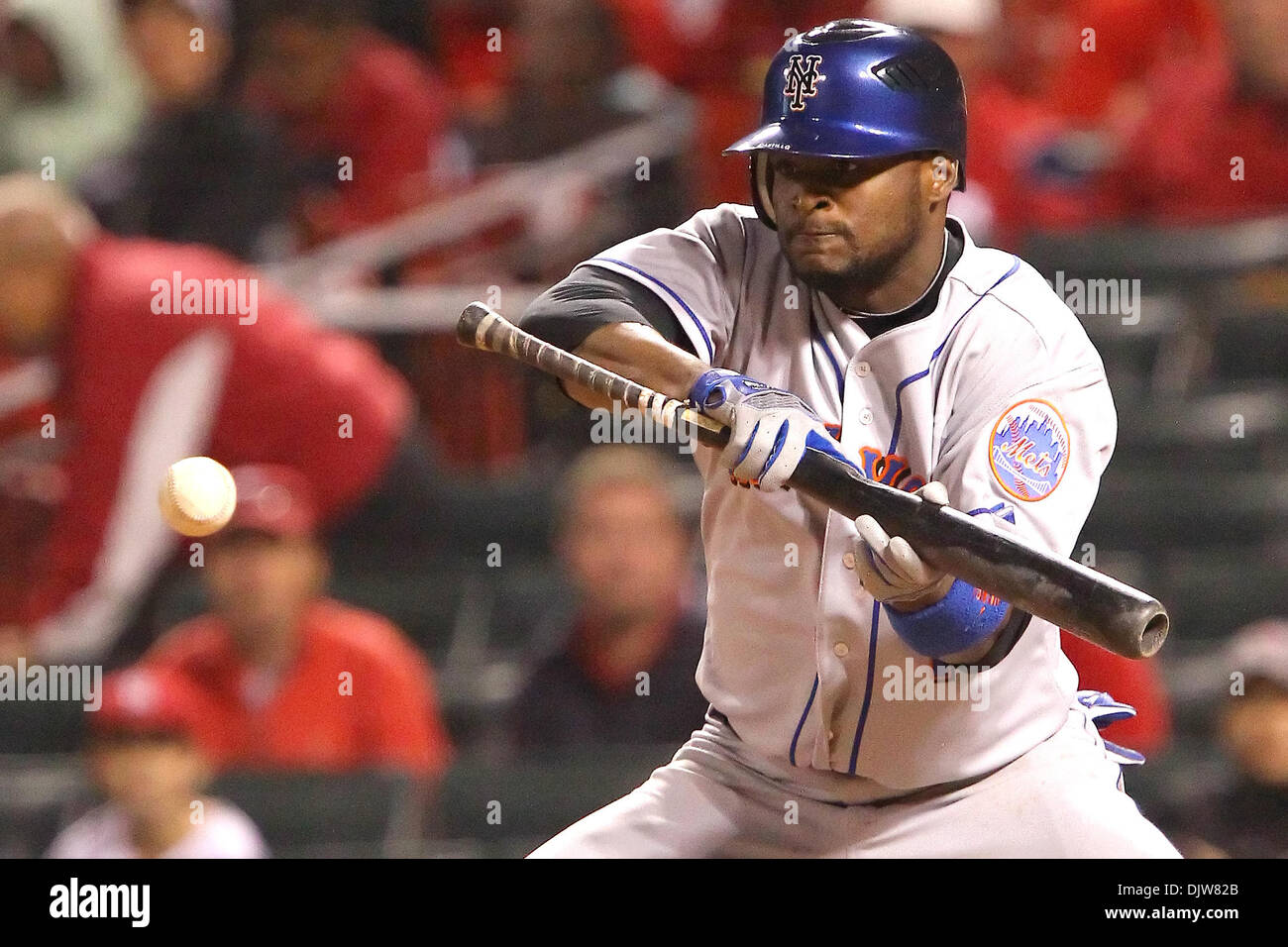 New York Mets second baseman Luis Castillo (1) attempts a bunt during ...