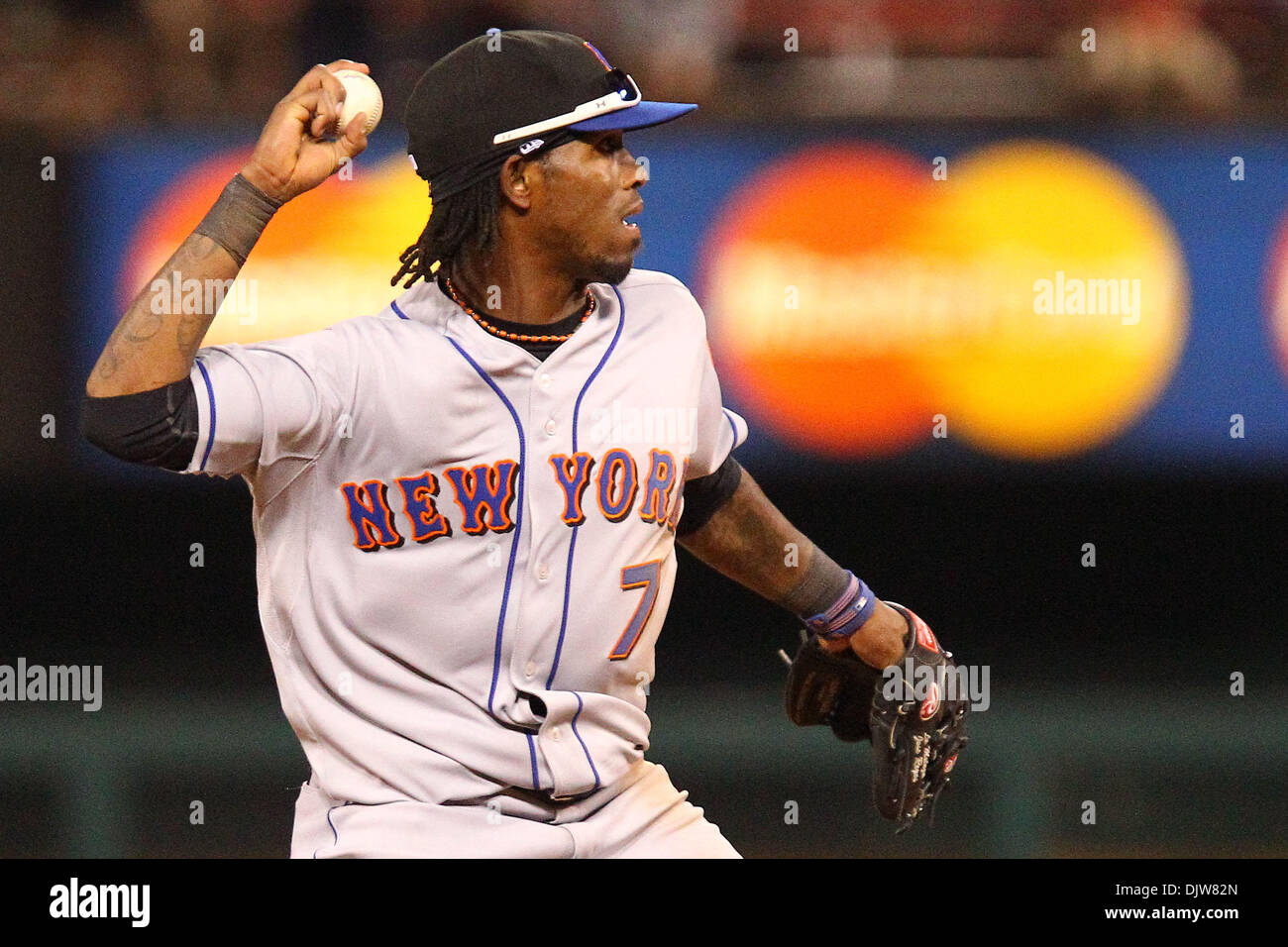 New York Mets shortstop Jose Reyes (7) fields a ground ball late in ...