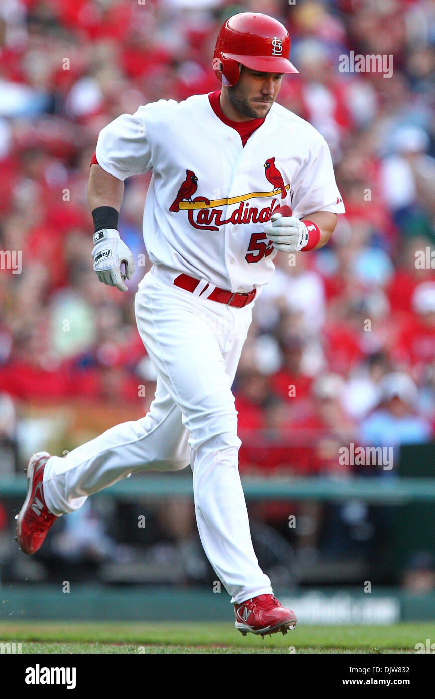St. Louis Cardinals second baseman Skip Schumaker (55) takes first base ...