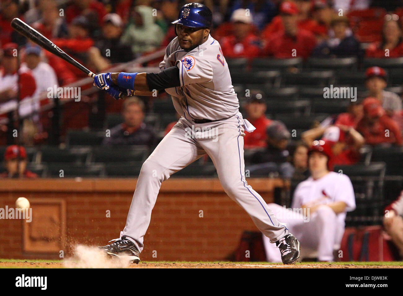 New York Mets second baseman Luis Castillo (1) watches the ball go ...