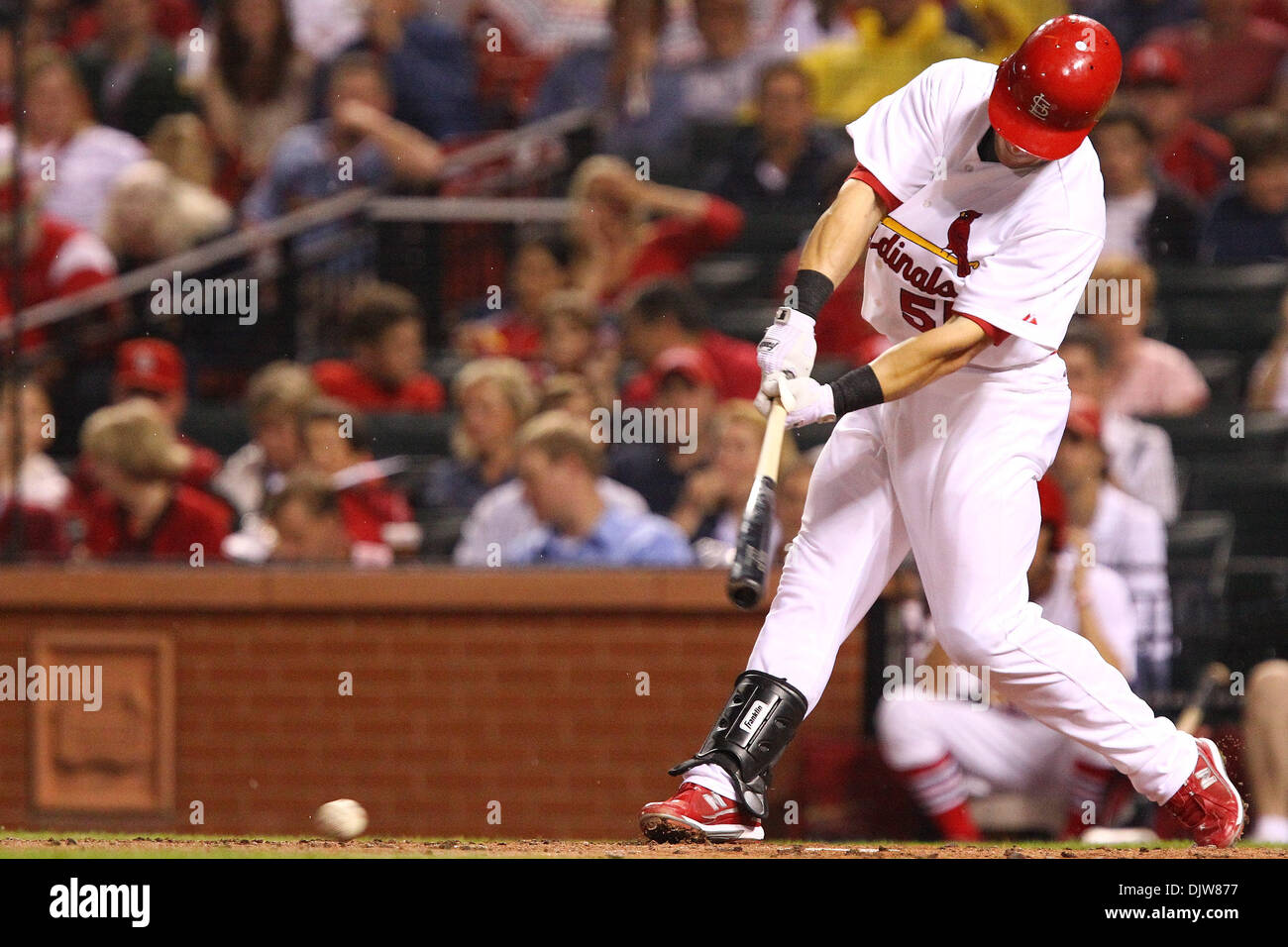 St. Louis Cardinals second baseman Skip Schumaker (55) puts a ball into ...