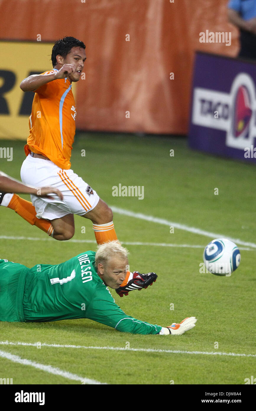 Luis Landin (#7) Forward for the Houston Dynamo chips the ball over ...