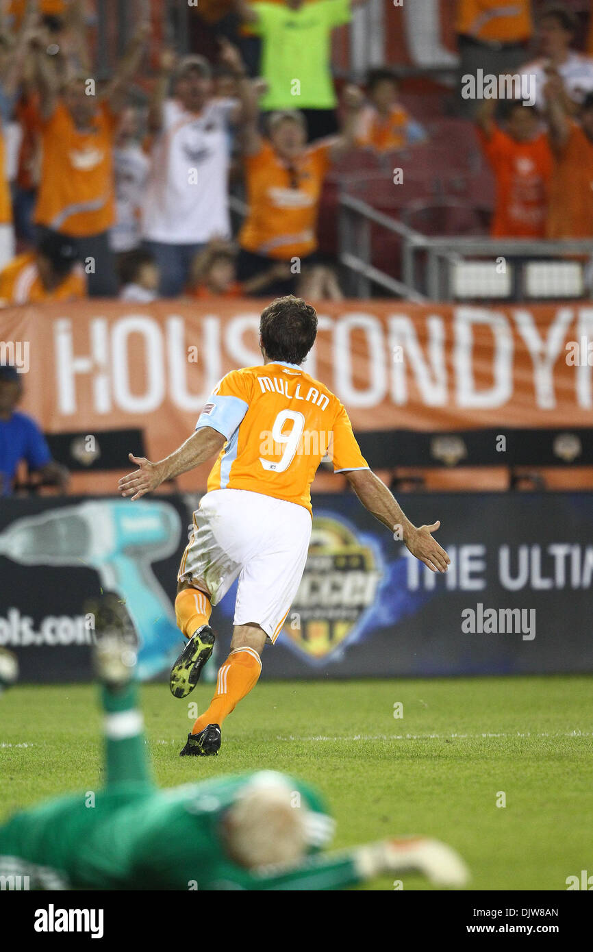 Brian Mullan (#9) Midfielder for the Houston Dynamo runs hands out in ...