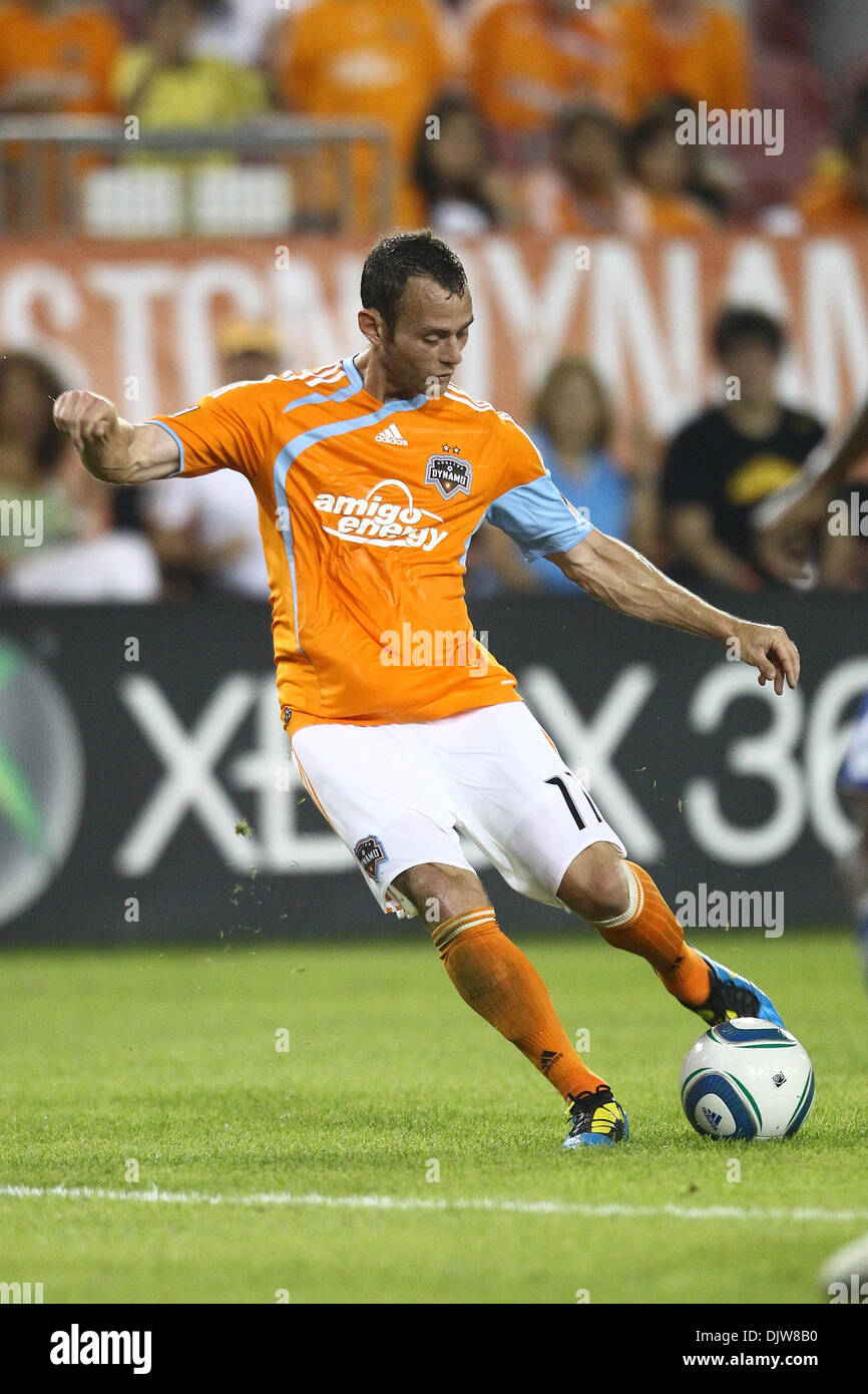 Brad Davis (#11) Midfielder for the Houston Dynamo kicks the ball alone ...