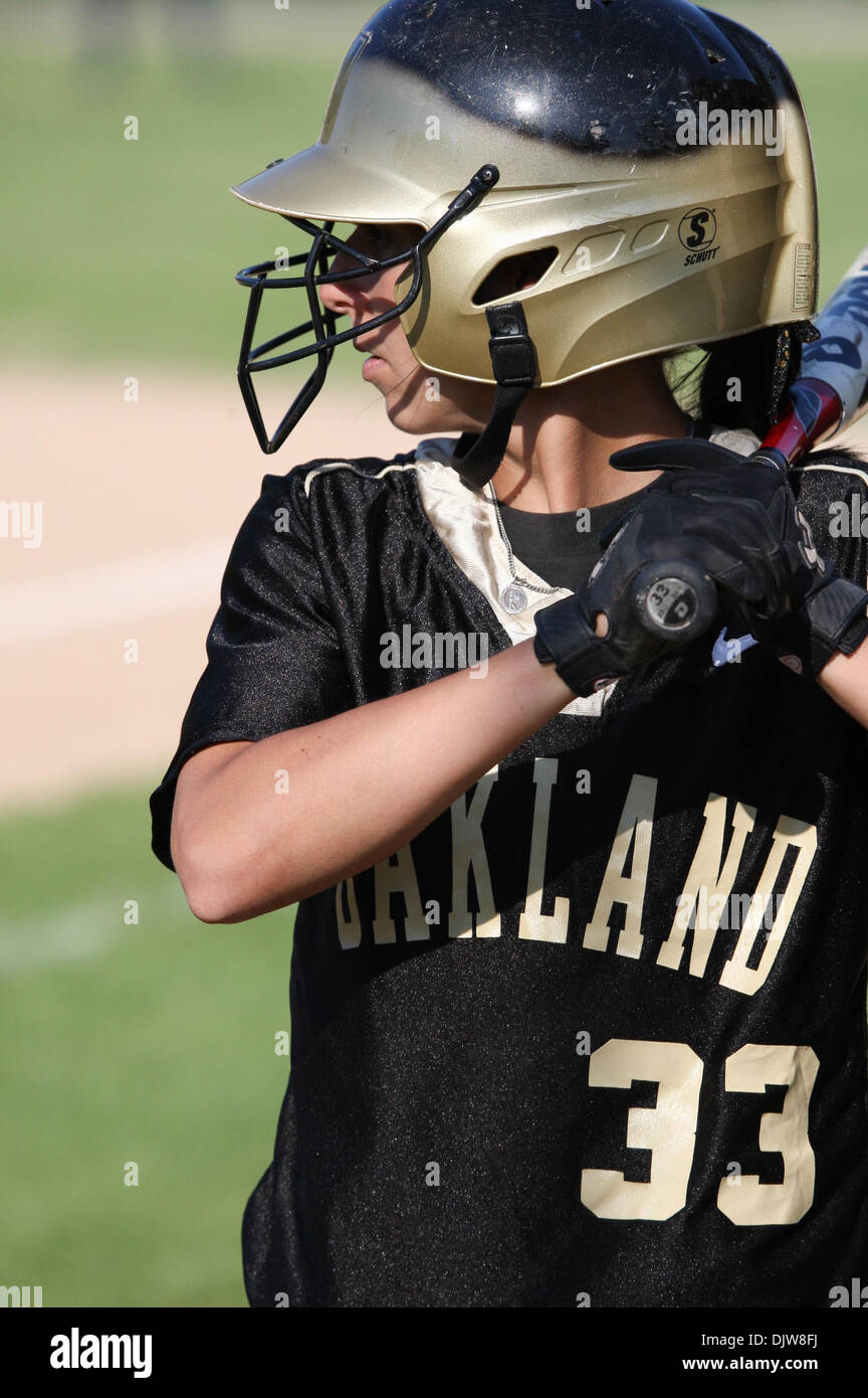 Oakland centerfielder Anne Cicchini (33) prepares in the on deck circle ...