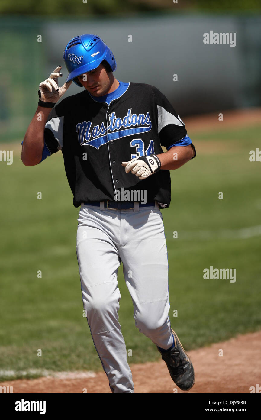 IPFW Infielder Shaun VanDriessche (34) homers to tie the game at 1-1 in ...