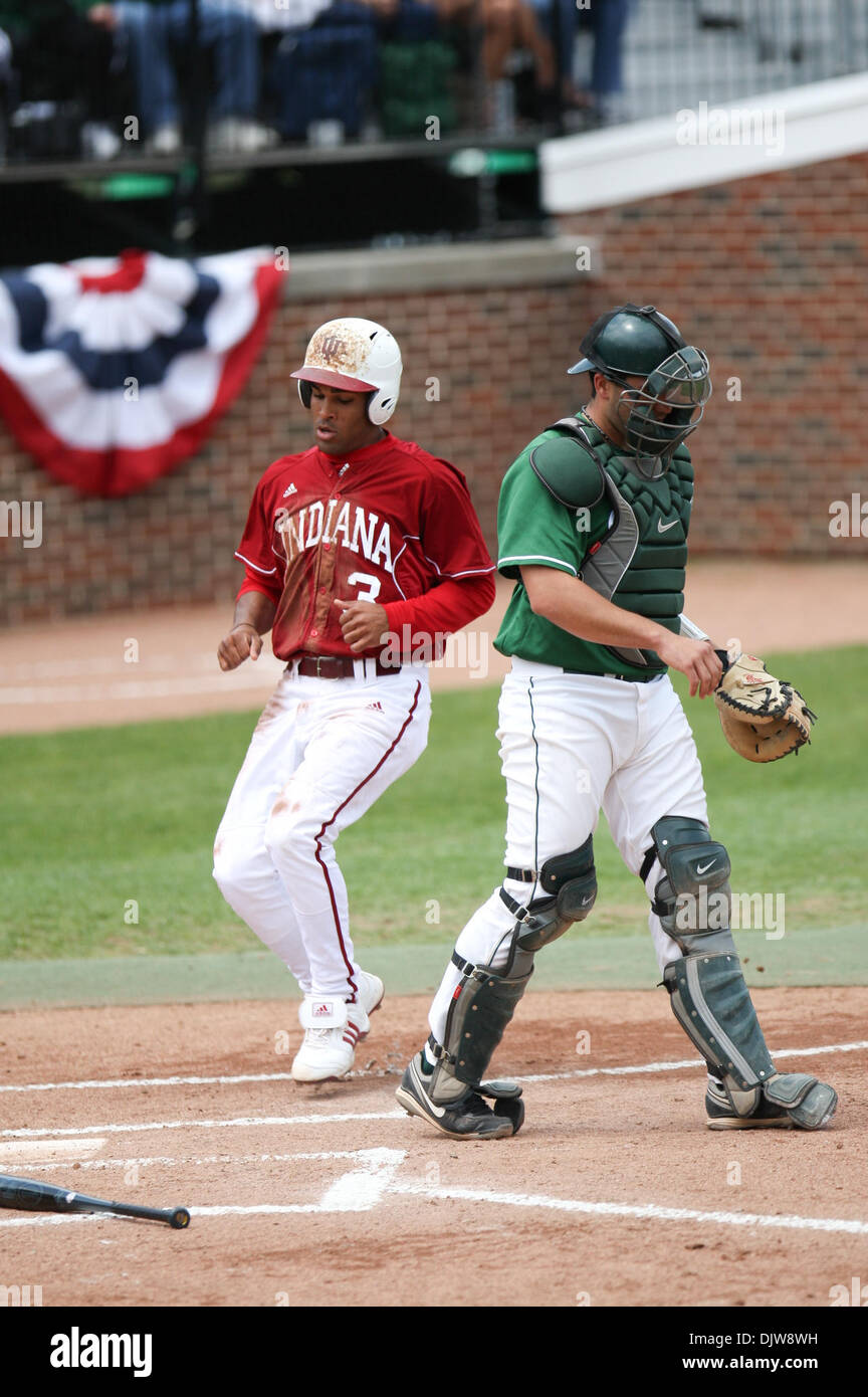 Indiana 2B Micah Johnson (3) scores the first Hoosier run in the first ...