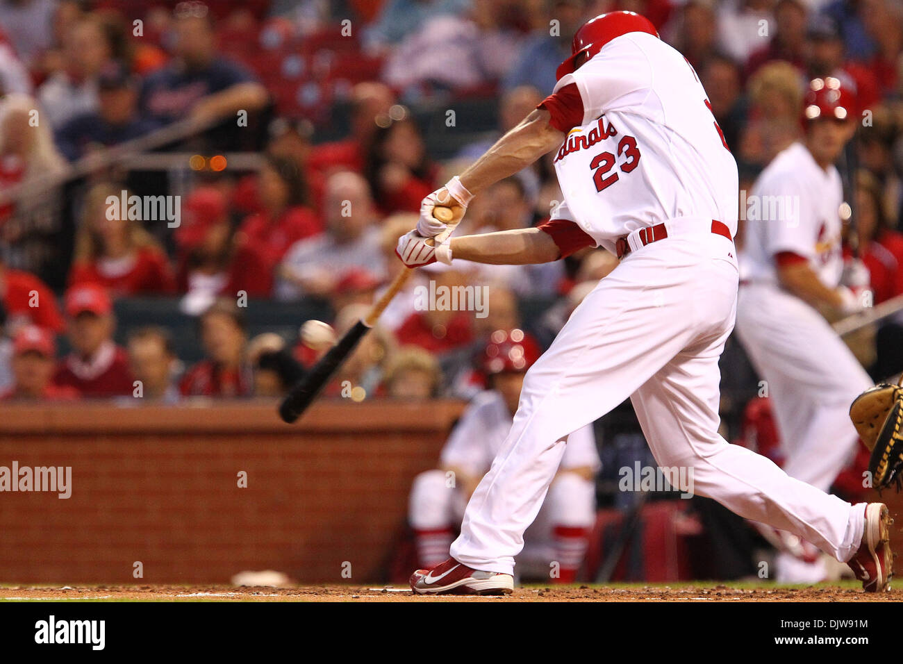 St. Louis Cardinals starting pitcher Chris Carpenter (29) makes contact ...