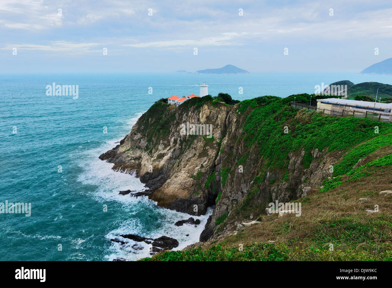 White small lighthouse. Hong Kong Stock Photo - Alamy