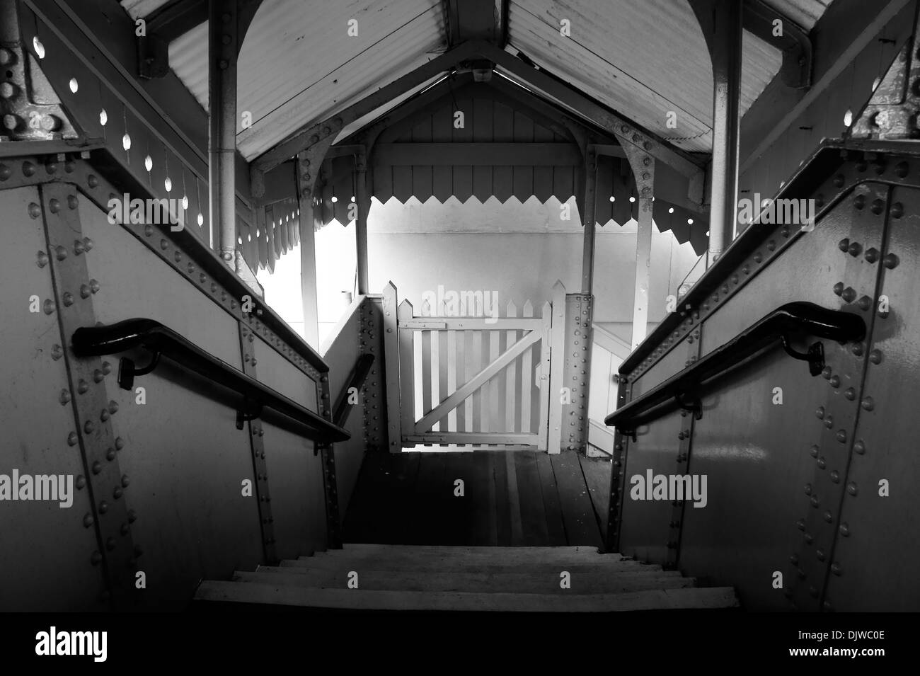 Black & White of steps down from inside the Footbridge at Churston ...