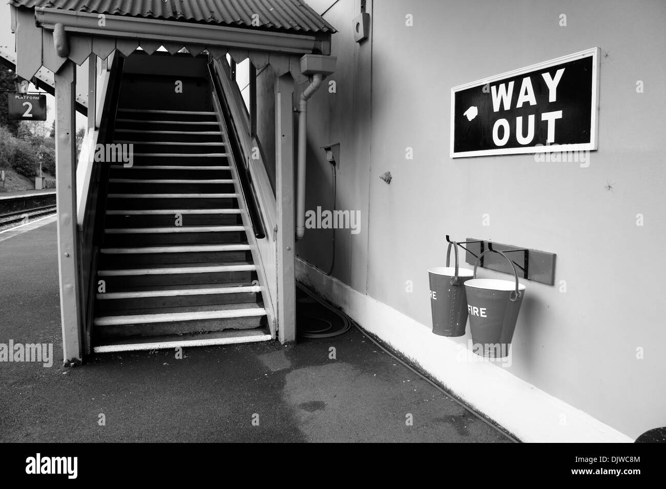 Fire exit sign uk Black and White Stock Photos & Images - Alamy